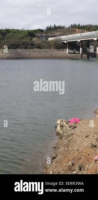 Aerial drone view young man is fishing in the lake high quality, lonely ...