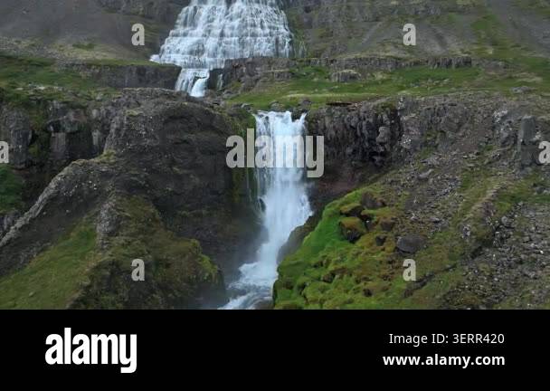 Aerial flight over the wild Strompgljufrafoss waterfall on a summer ...
