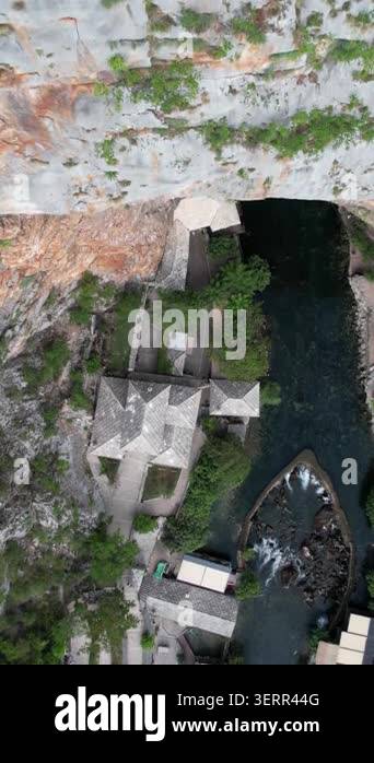Drone view of the historical ottoman lodge built under the rock Blagaj ...