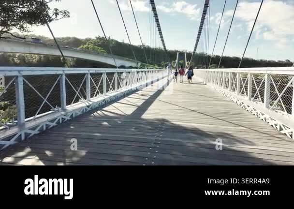 Scenic footage of the old suspension Bridge Pont Des Anglais in Saint ...