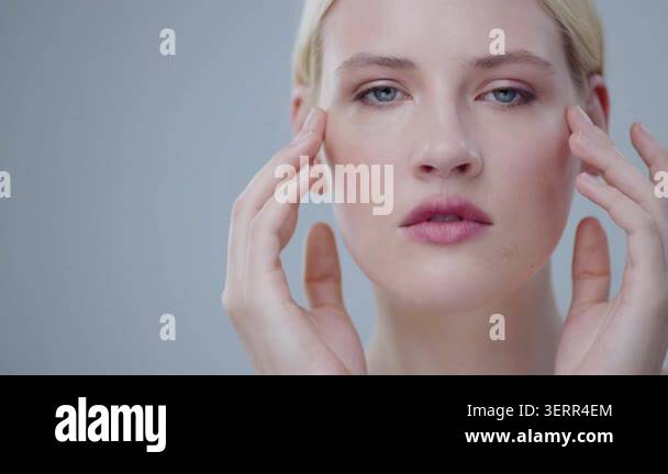 Portrait of attractive blonde girl with exceptional beauty posing in ...