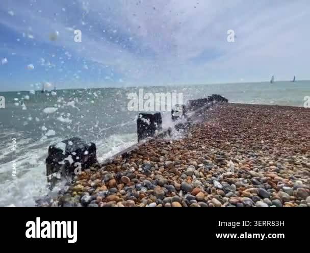 slow motion Stock video footage of a seaside wave splashing in slow ...