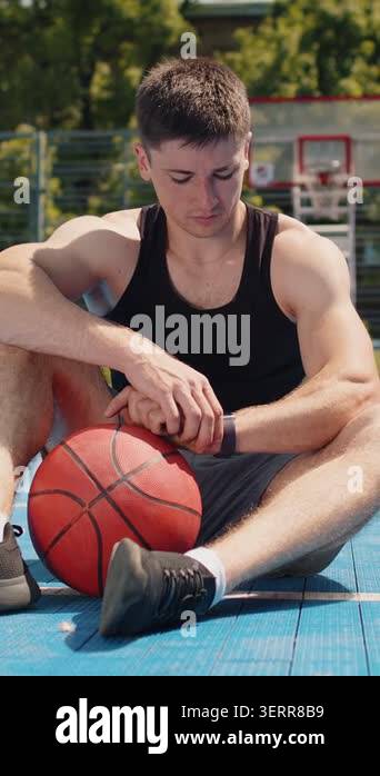 Portrait of tired athletic caucasian man in sportswear after playing ...