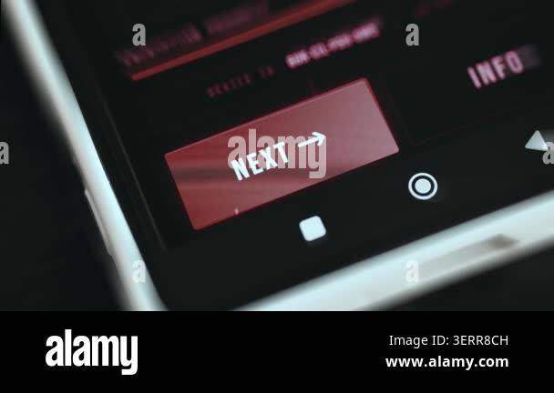Red NEXT button being tapped by user Stock Video Footage - Alamy