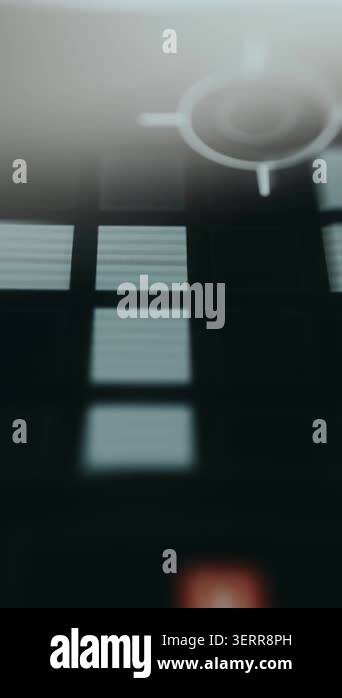 Grid interface with animated block illumination and target symbol Stock ...