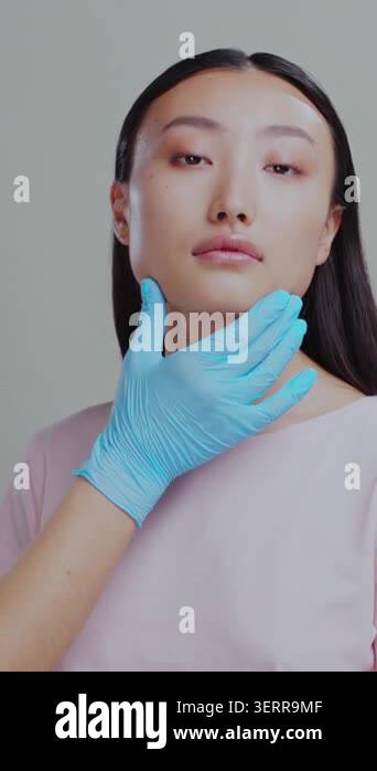 Chinese young asian woman visiting cosmetologist in beauty center ...