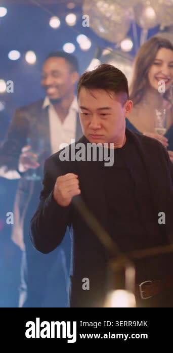 Young Happy Handsome Asian Man Dancing in Crowd of Corporate Colleagues ...