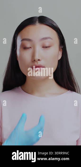 Chinese beautiful asian woman standing in beauty center with ...