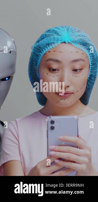 Asian young woman waiting for face plastic surgery using smartphone ...