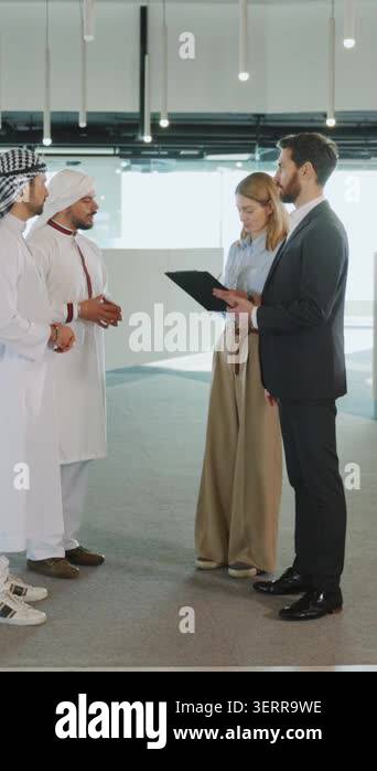 Multi-ethnic group of business people collaborating in corporate ...