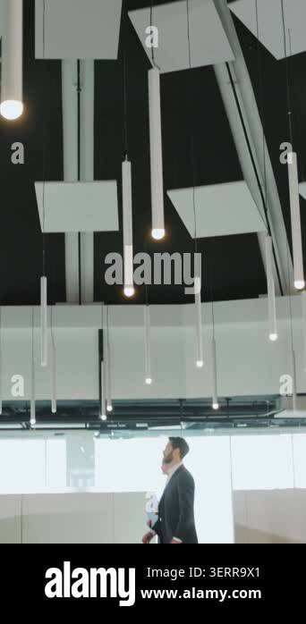 In beautiful modern business center IT company two polite managers ...