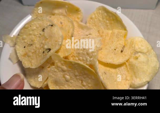 Panning Shot of Traditional Indonesian Opak Cassava Crackers in a Bowl ...