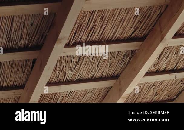 Interior view of a rustic ceiling made with natural thatch and ...