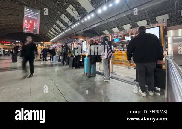 Istanbul, Turkey - 24 Jan 2026: Time lapse of passengers using self ...