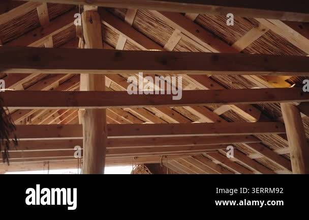Traditional architecture featuring an interior view of a wooden frame ...