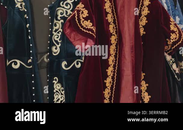 Colorful traditional kazakh clothing made of velvet and silk with ...