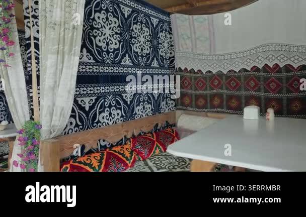 Authentic interior of a traditional Uzbek restaurant with ethnic ...