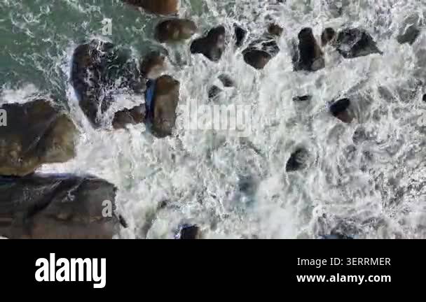 Tropical beach with waves hitting on the rocks at Brazil Stock Video ...