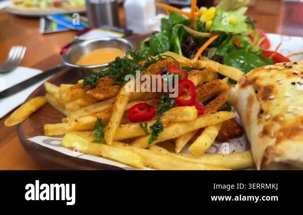 Mexican Food Delicious Burrito with French Fries and Salad Stock Video ...