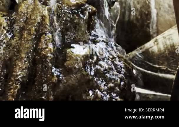 Waterfall Seeping through The small Stones Stock Video Footage - Alamy
