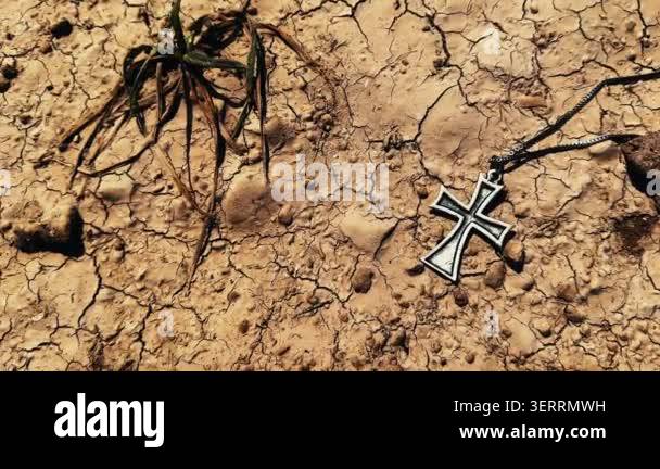 Religion Symbol Cross on Dry Soil Ground Stock Video Footage - Alamy
