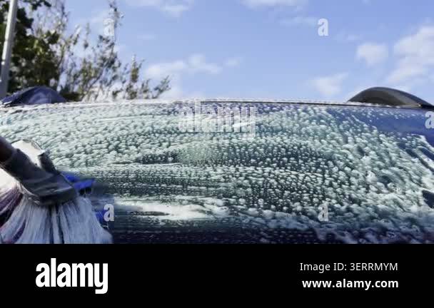 Car Washing Pure Foam and Water Stock Video Footage - Alamy