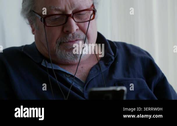 Elderly Old Man is looking to Cellphone Stock Video Footage - Alamy