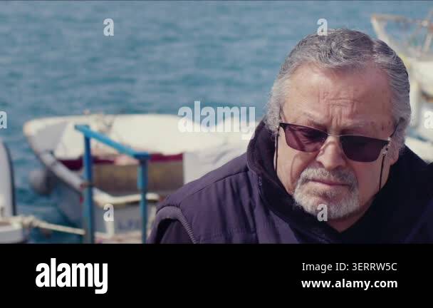 Elderly Man Portrait Outdoor in a Seaside Town Stock Video Footage - Alamy