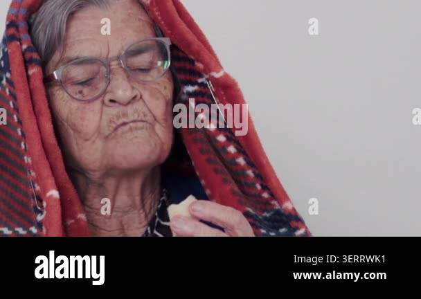 Old Woman is Eating Fruit Apple Stock Video Footage - Alamy
