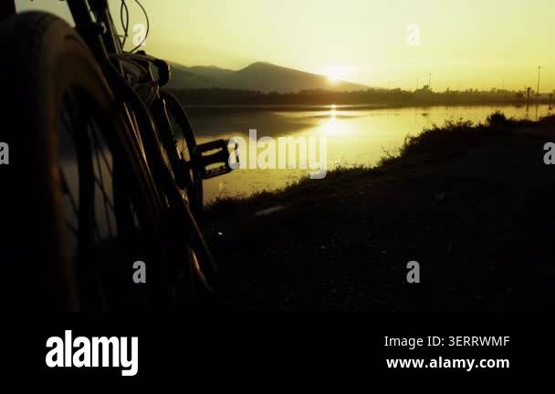 Bicycle and Romantic Sunset Light Near the Sea in Nature Stock Video ...