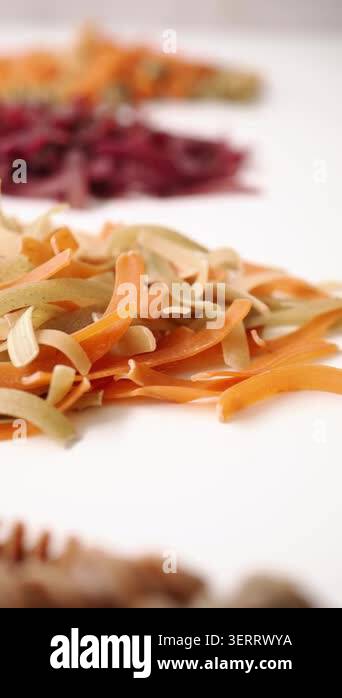 Different types of pasta are spread out on a table for inspiration ...