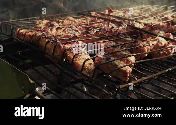 Chicken Meat On Barbecue Fire Stock Video Footage - Alamy