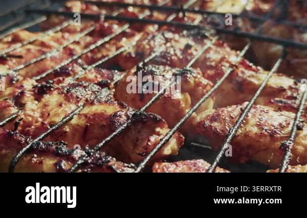 Chicken Meat On Barbecue Fire Stock Video Footage - Alamy