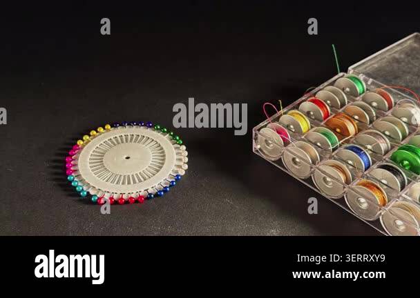 Colored Thin Spools of Thread Needles Colorful Buttons and Scissors and ...