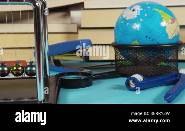 Educational Concept Newtons Cradle and School Office Equipment Tools ...
