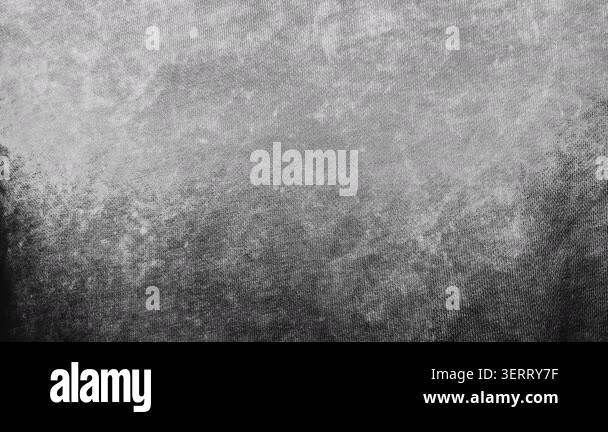 cinematic macro panning shot of textured denim fabric morphing under ...