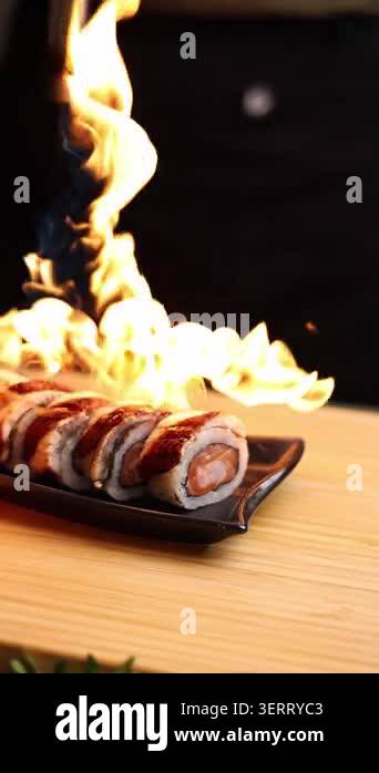 Close-up of delicious Japanese sushi rolls served fresh on a plate in a ...