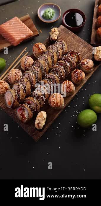 Close-up of delicious Japanese sushi rolls served fresh on a plate in a ...