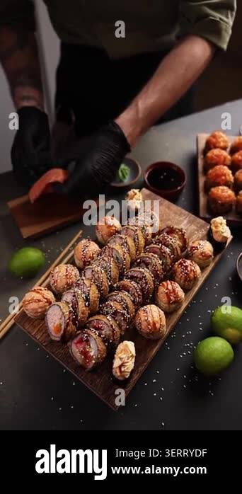 Close-up of delicious Japanese sushi rolls served fresh on a plate in a ...