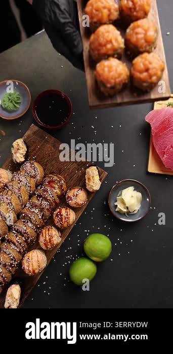 Close-up of delicious Japanese sushi rolls served fresh on a plate in a ...