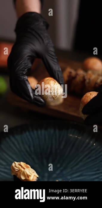 Close-up of delicious Japanese sushi rolls served fresh on a plate in a ...