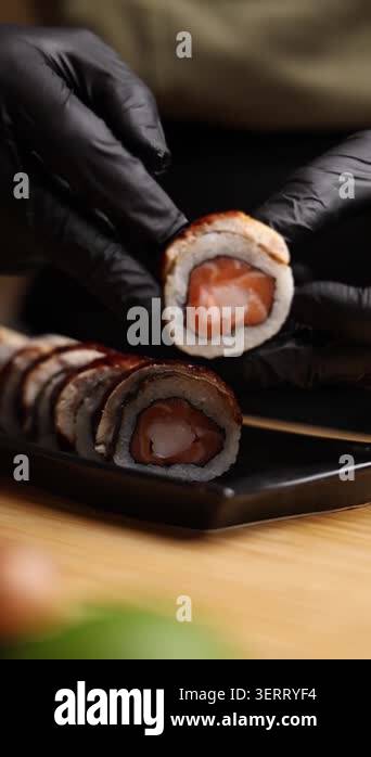Close-up of delicious Japanese sushi rolls served fresh on a plate in a ...