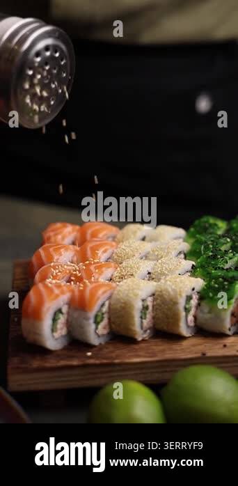 Close-up of delicious Japanese sushi rolls served fresh on a plate in a ...