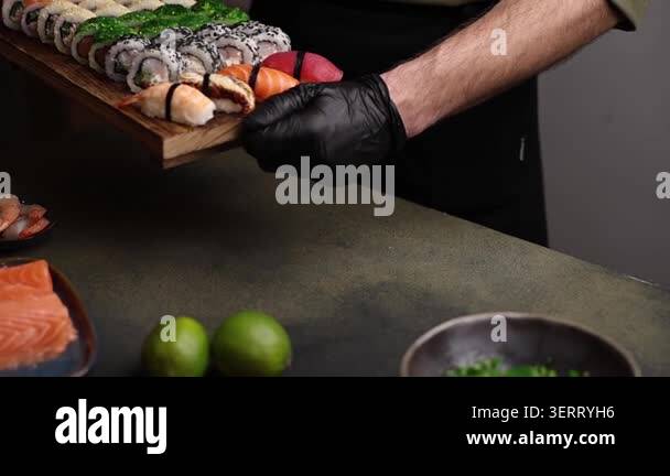 Close-up of delicious Japanese sushi rolls served fresh on a plate in a ...