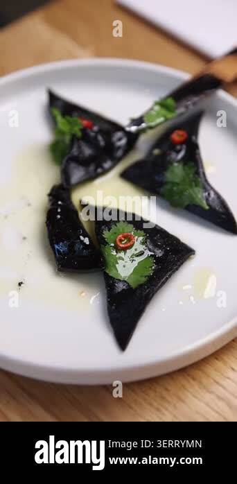 Guests enjoying delicious food in a stylish restaurant. Close-up shots ...