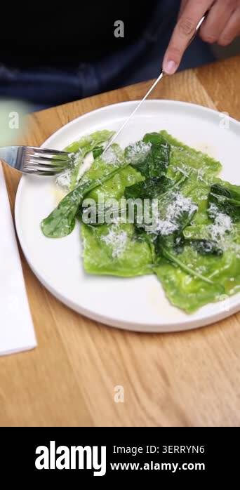 Guests enjoying delicious food in a stylish restaurant. Close-up shots ...