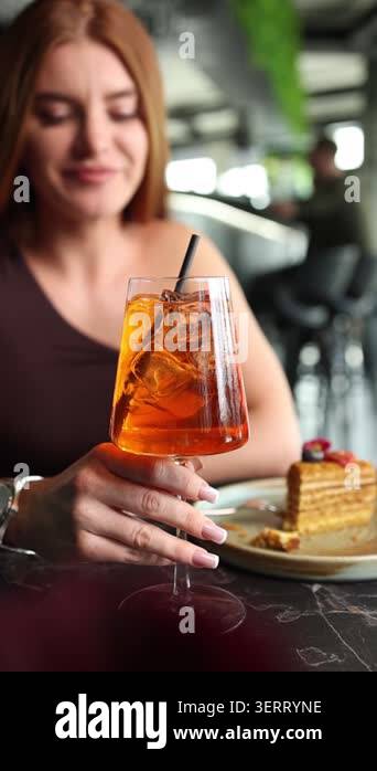 Bartender preparing a signature cocktail in a stylish moody bar Stock ...