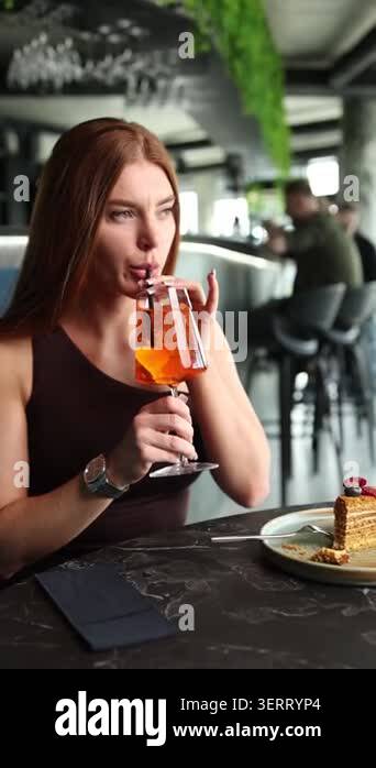 Bartender preparing a signature cocktail in a stylish moody bar Stock ...