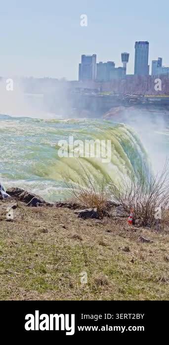 Niagara Falls is visible with water cascading down the edge. The ...