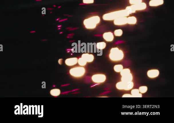 Vertical abstract light trails with motion blur creating a dynamic and ...